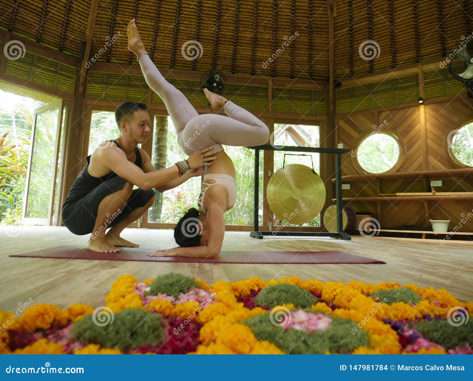 Young Beautiful and Fit Woman with Acrobat Man As Yoga Coach Learning ...