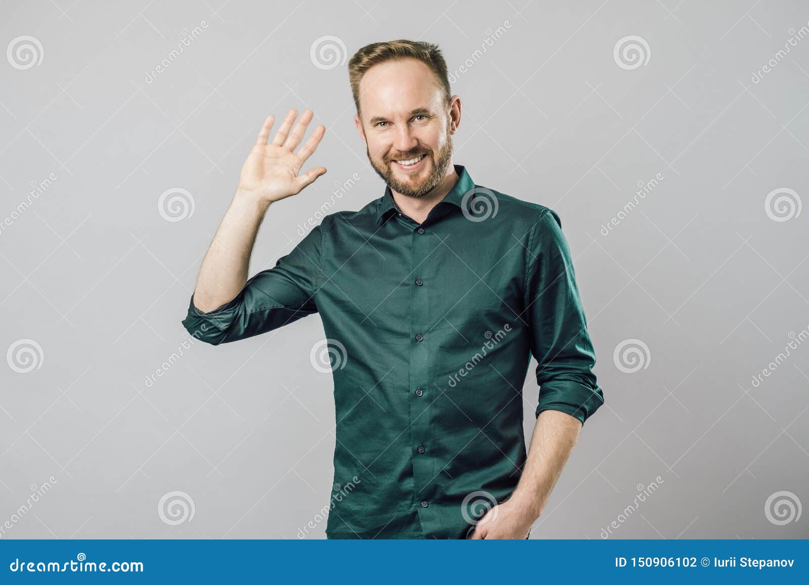 Friendly and Happy Young Bearded Man Saying Hi Over Gray Background ...