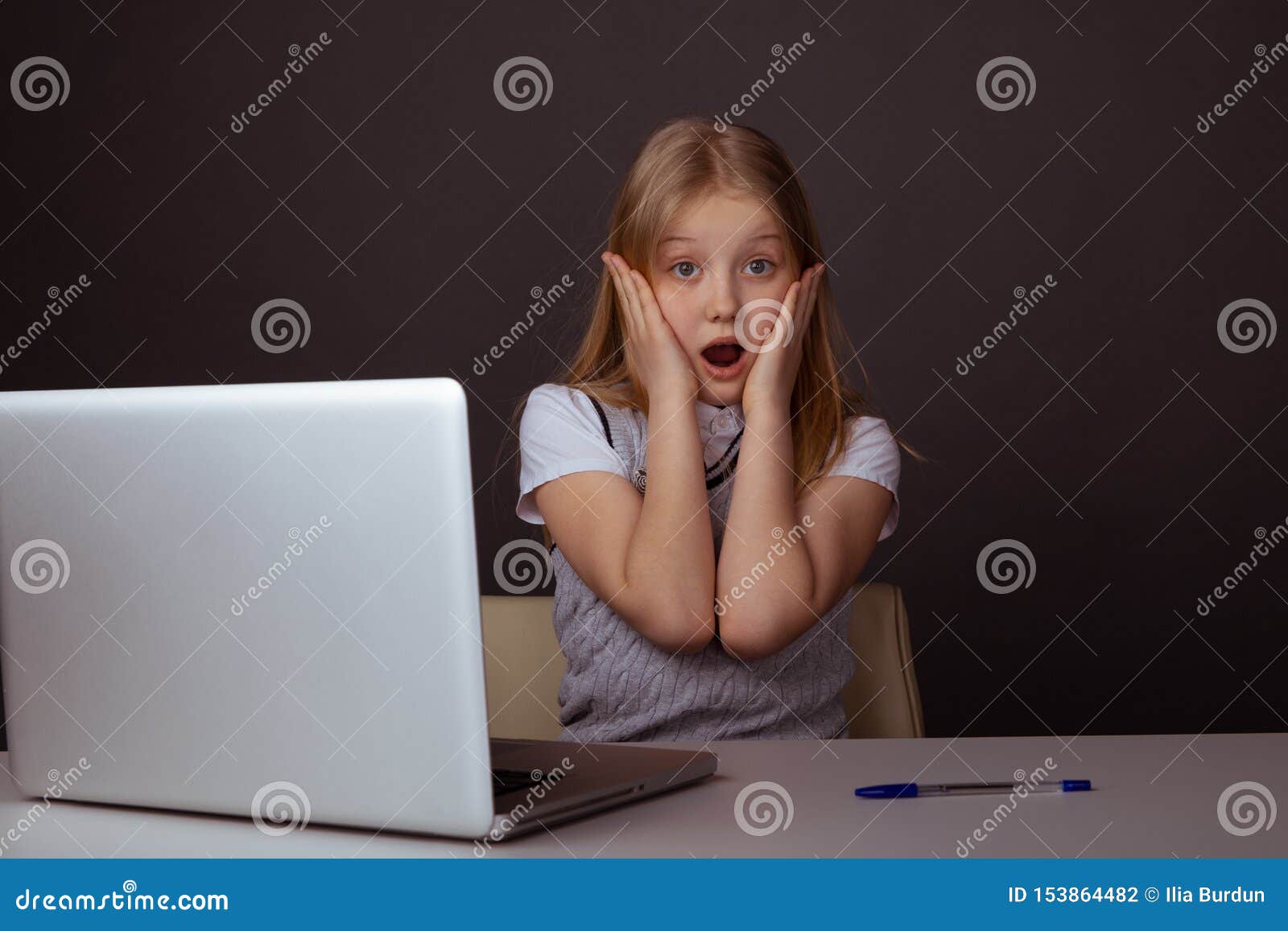Surprised Young Student Sitting Infront of the Computer in the Class ...