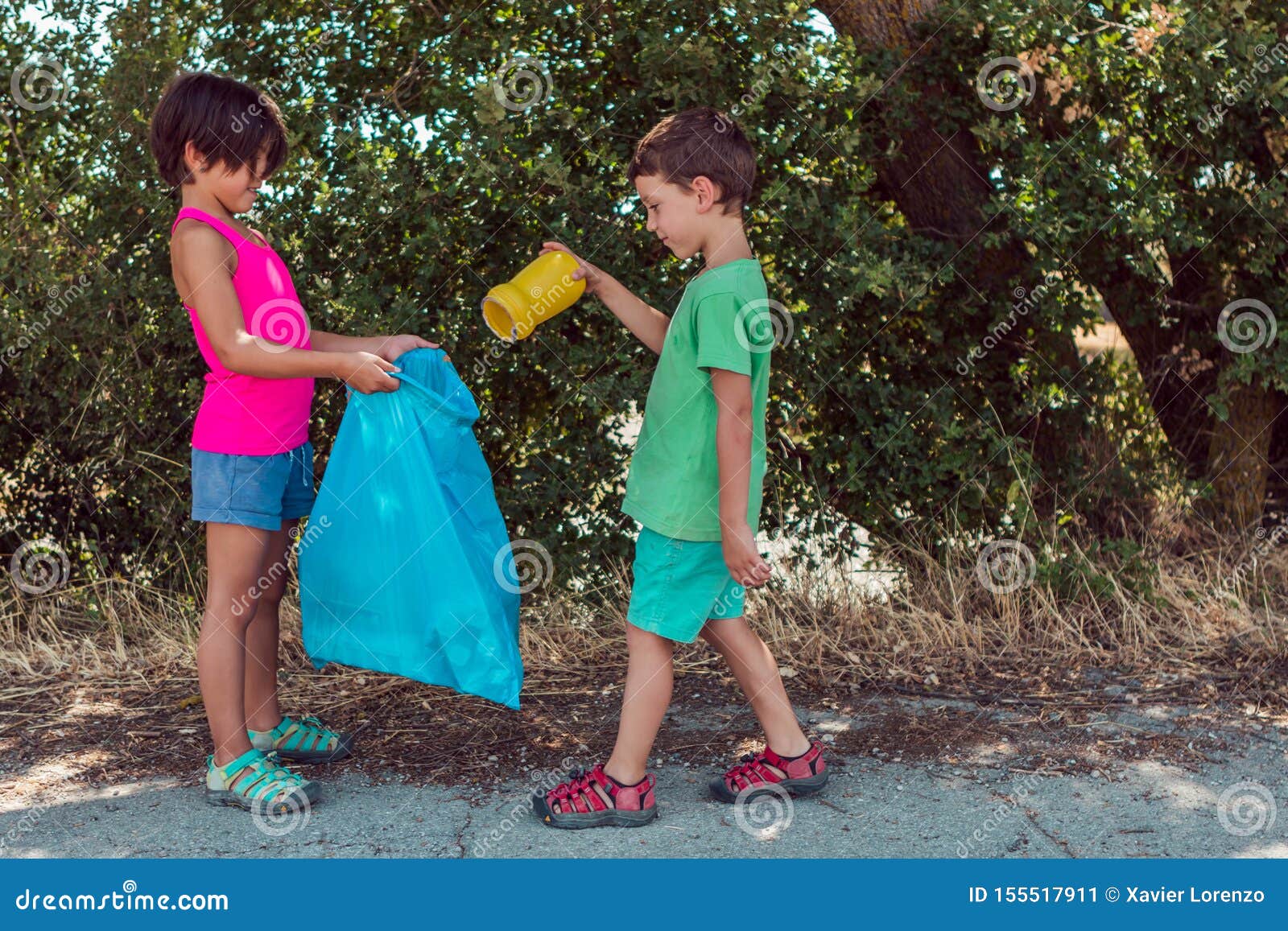 Two Kind Children Doing School Tasks and Collecting Garbage with a ...