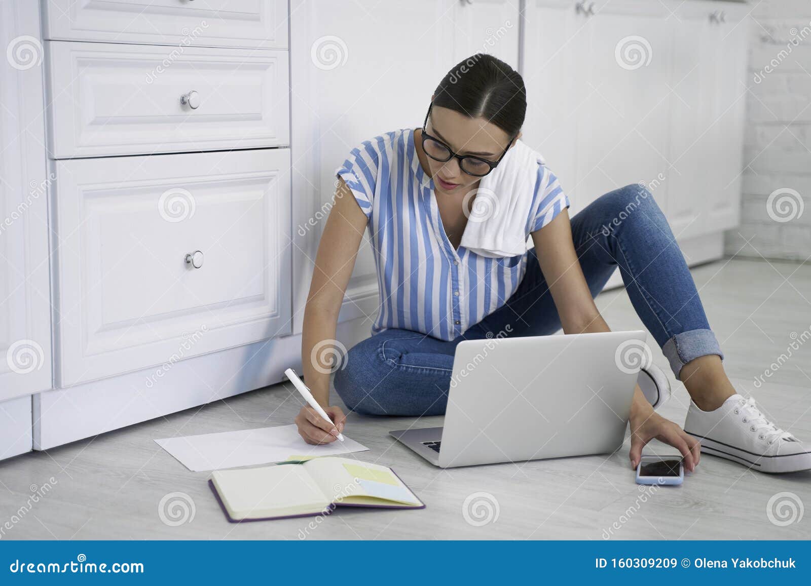 Busy Woman Writing and Taking Smartphone Stock Photo Stockbild - Bild ...