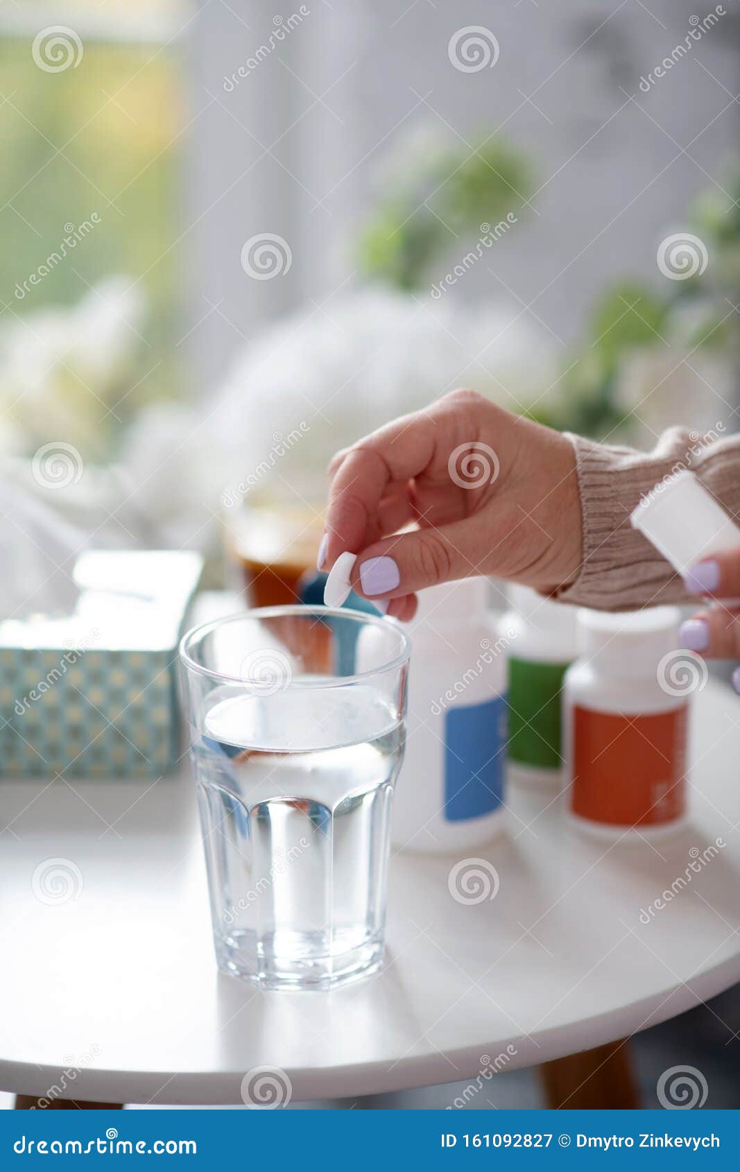 Woman Putting Pill into Glass of Water while Taking Vitamins 库存图片 - 图片 ...