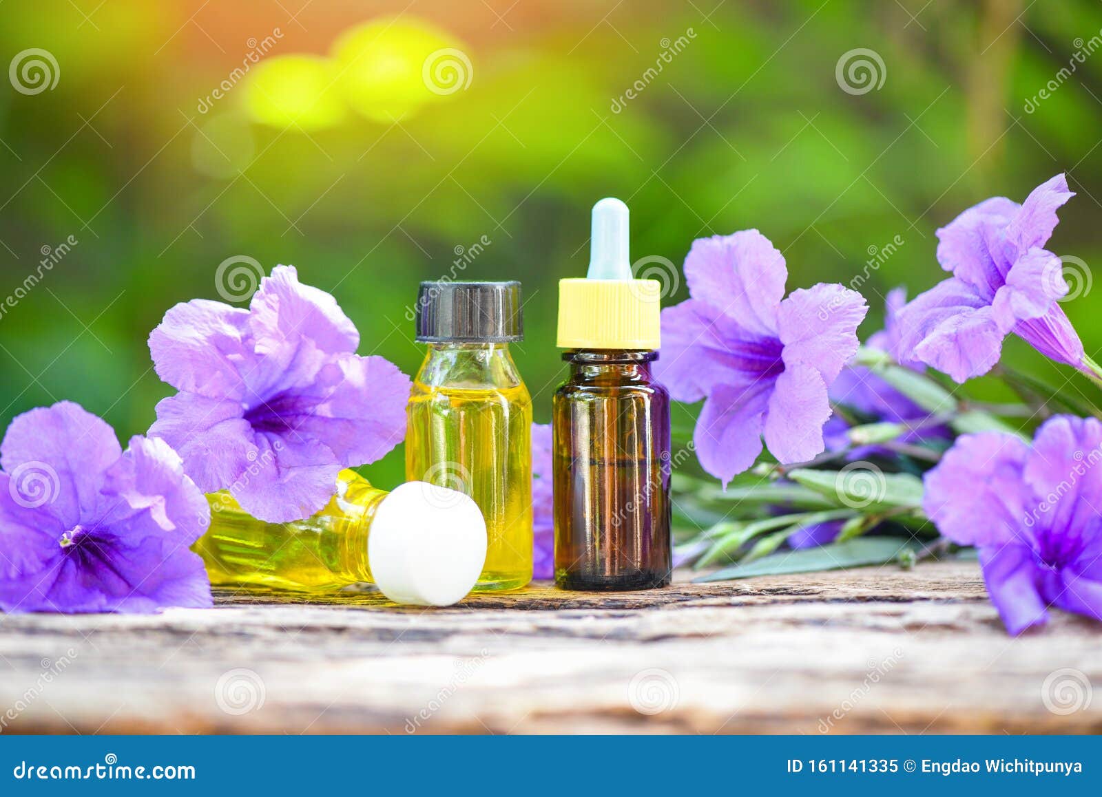 Aromatherapy Herbal Oil Bottles Aroma with Flower Purple on Nature ...