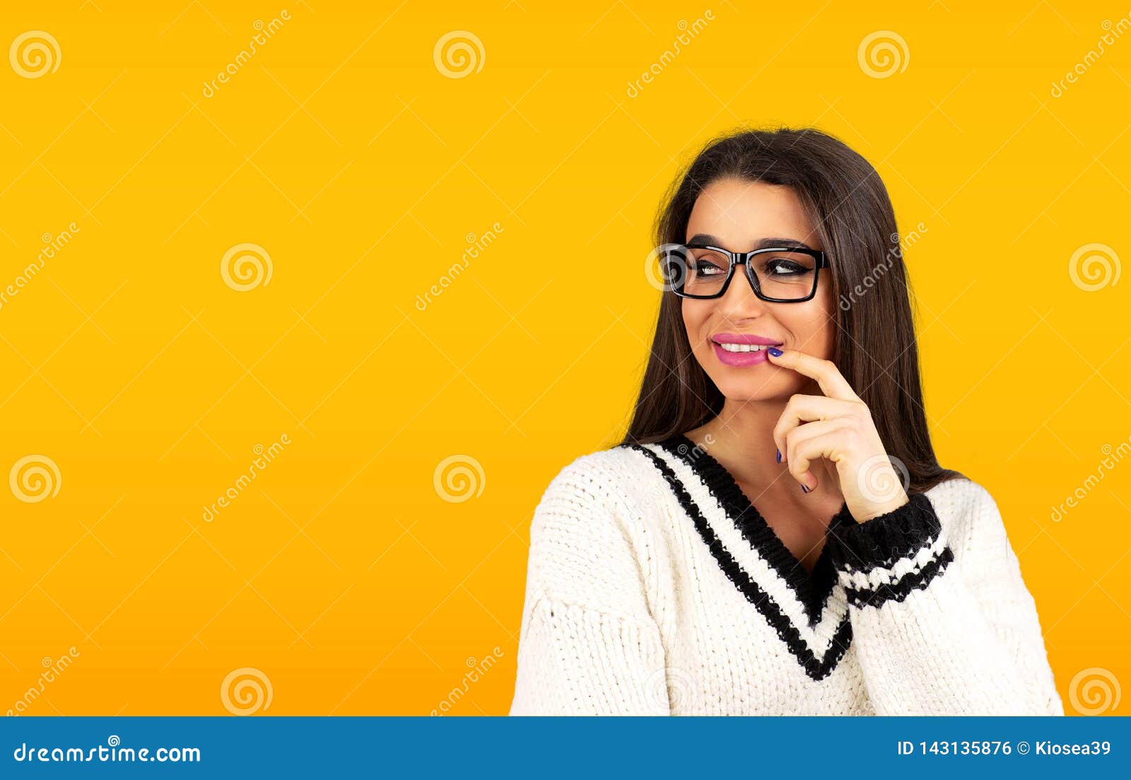 Smiling Flirting Woman with Finger on Lips Looking Sideways Foto de ...