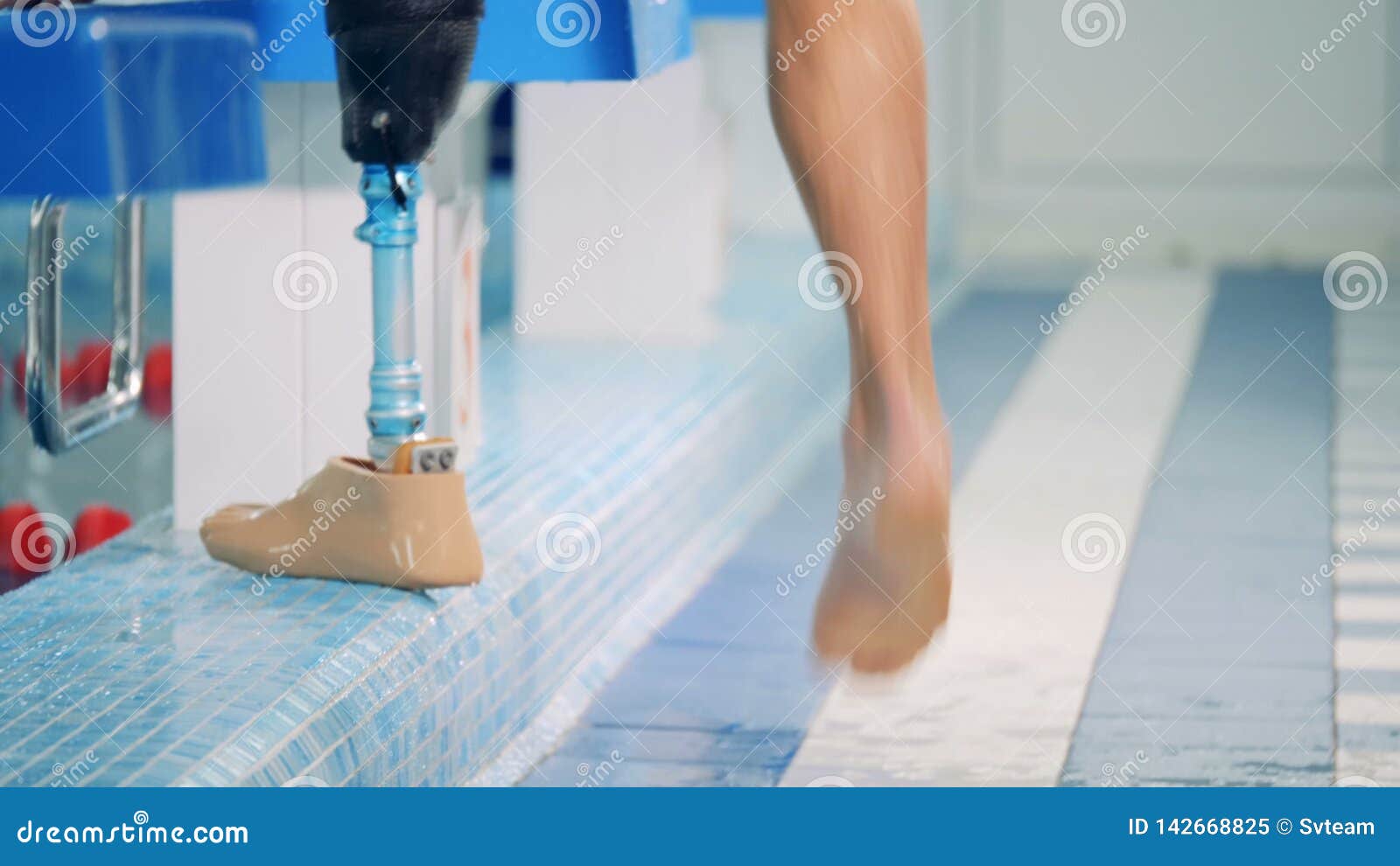 Swimmer Wears Bionic Prosthesis during a Pool Training, Artificial Leg ...