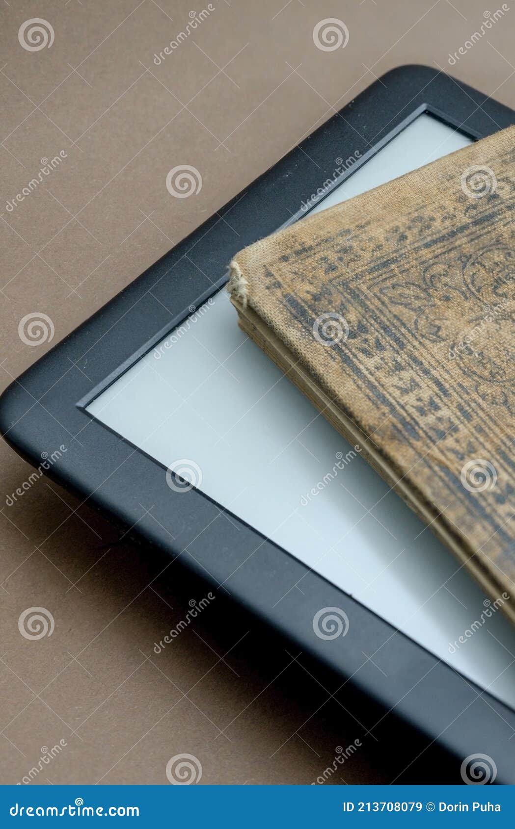 E Reader Emerging from an Very Old Book, with Beautiful Covers Stock ...