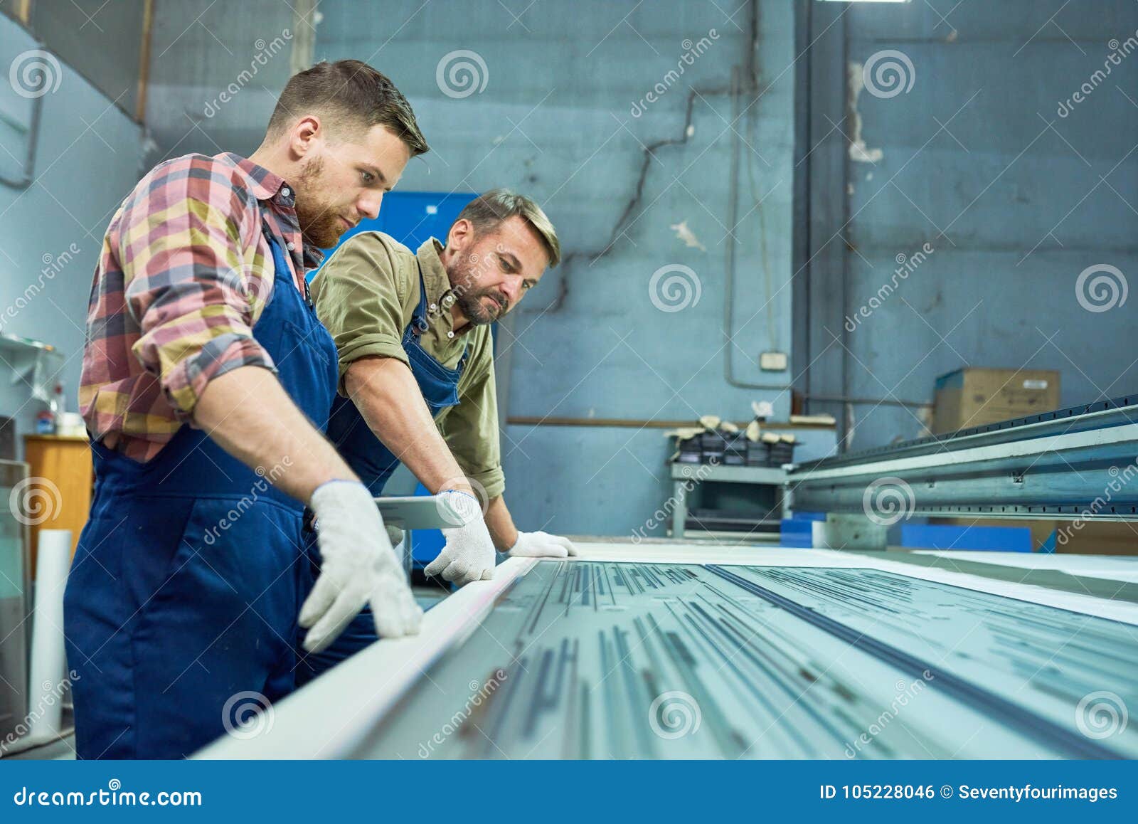 Workers Operating Laser Engraving Machine Stock Photo - Image of ...