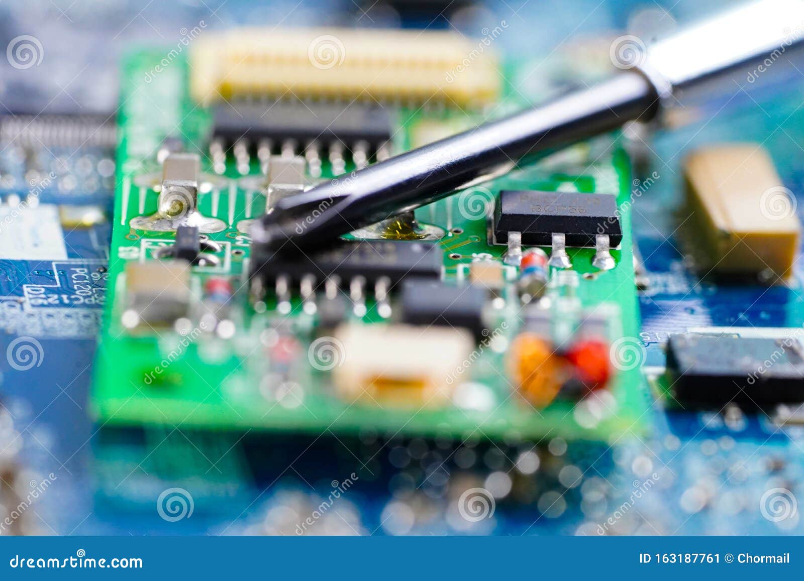 E-waste, Repairing Inside of Hard Disk by Soldering Iron. Integrated ...