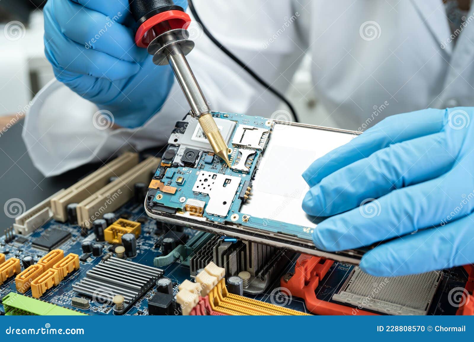 E-waste, Technician Repairing Inside of Hard Disk by Soldering Iron ...