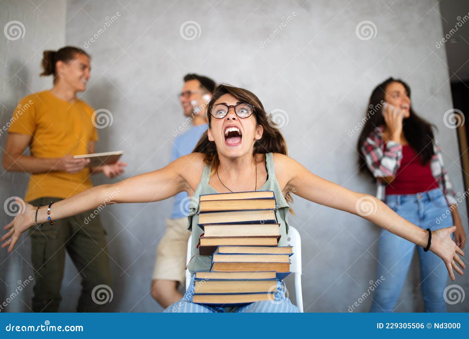 Eager Student Overwhelmed by Studying and Reading Books Stock Photo ...