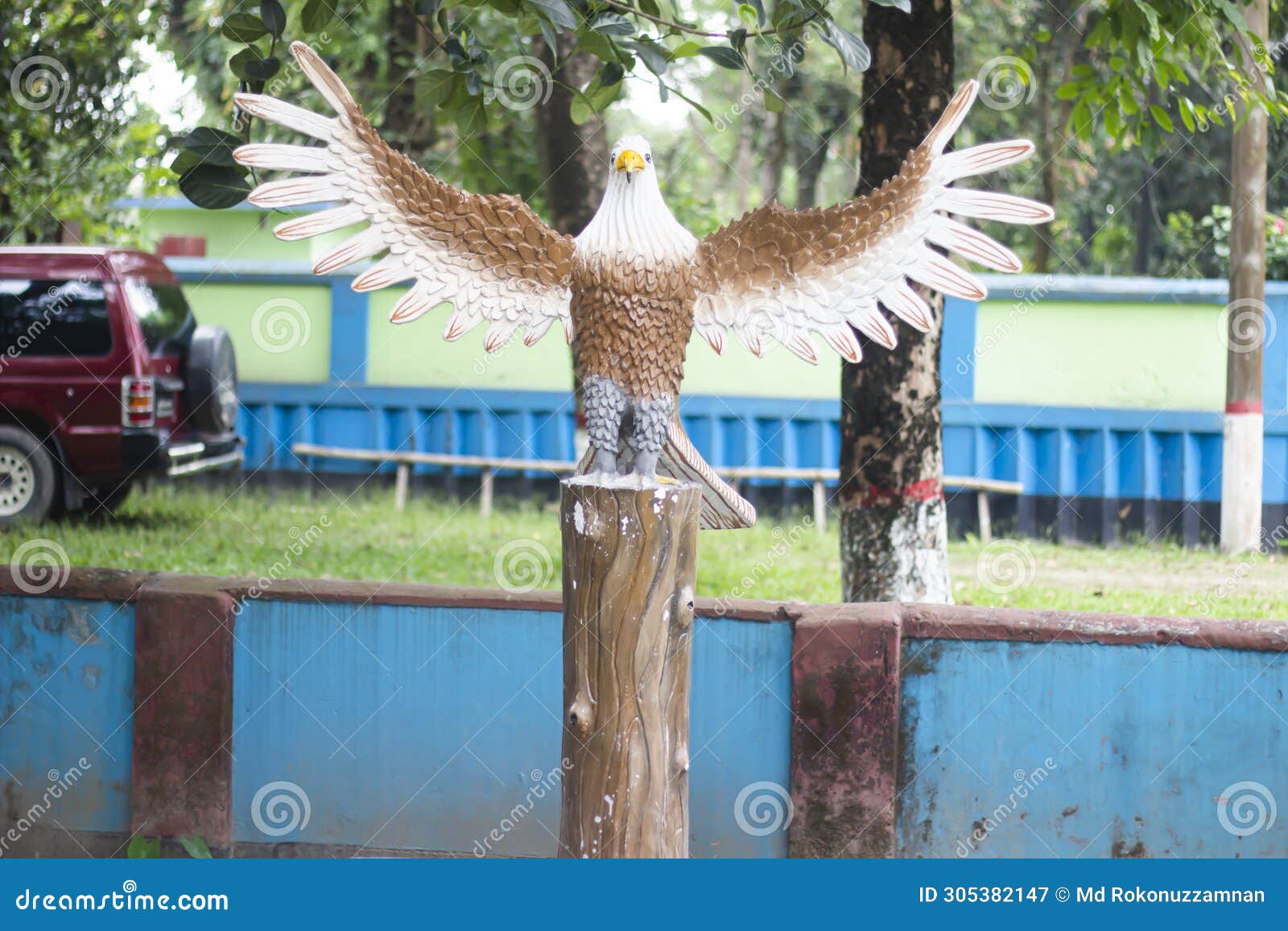 A Eagle Bird Made of a Brick Cement Background Blur Stock Image - Image ...