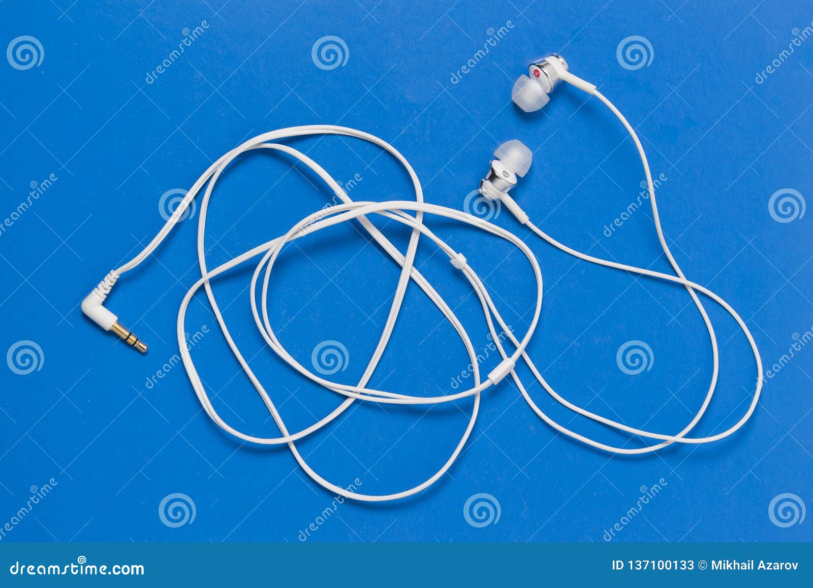 Ear Buds or Earphones on Blue Background Stock Image - Image of blue ...