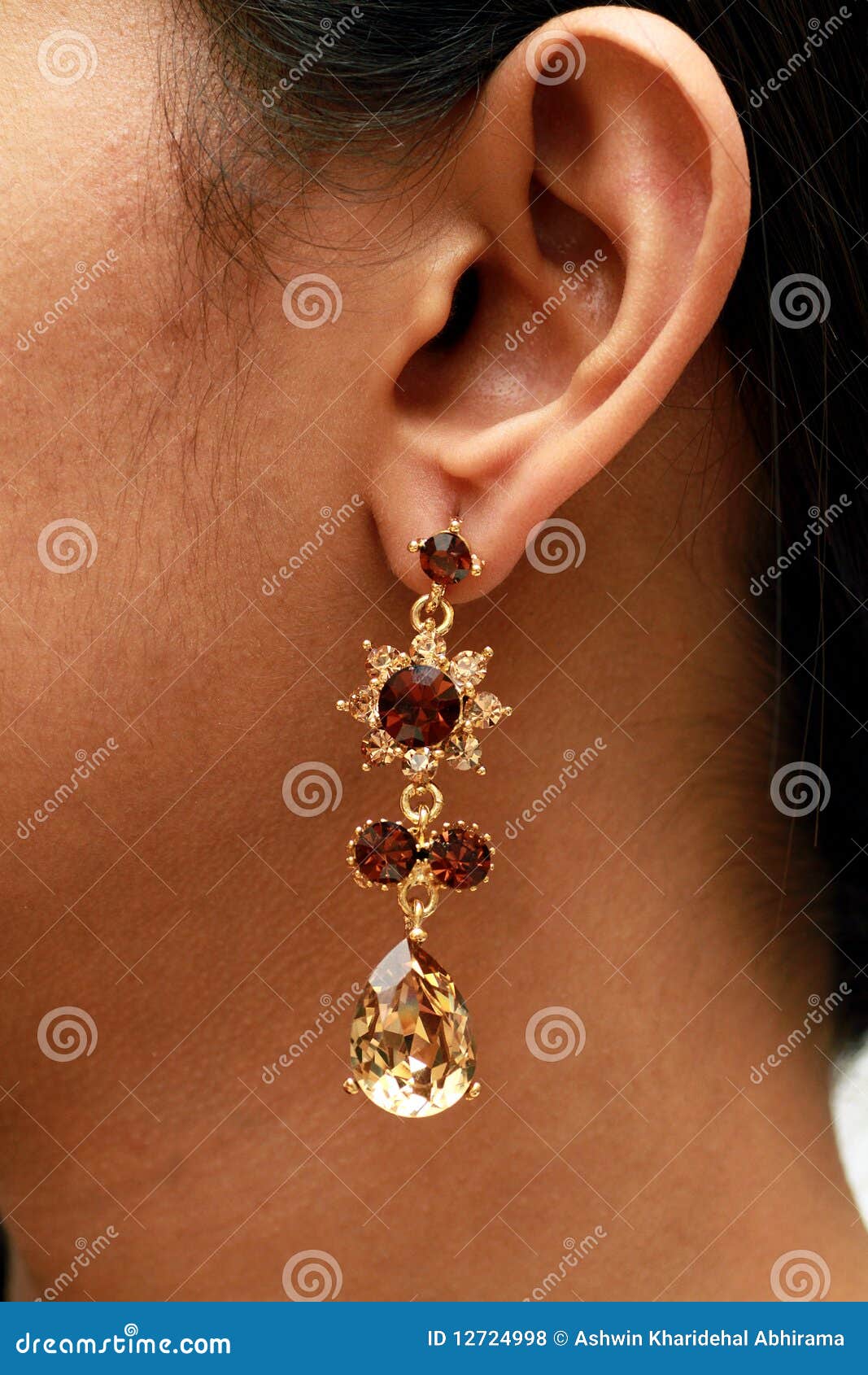 Ear with earring. stock photo. Image of jewelery, gold - 12724998