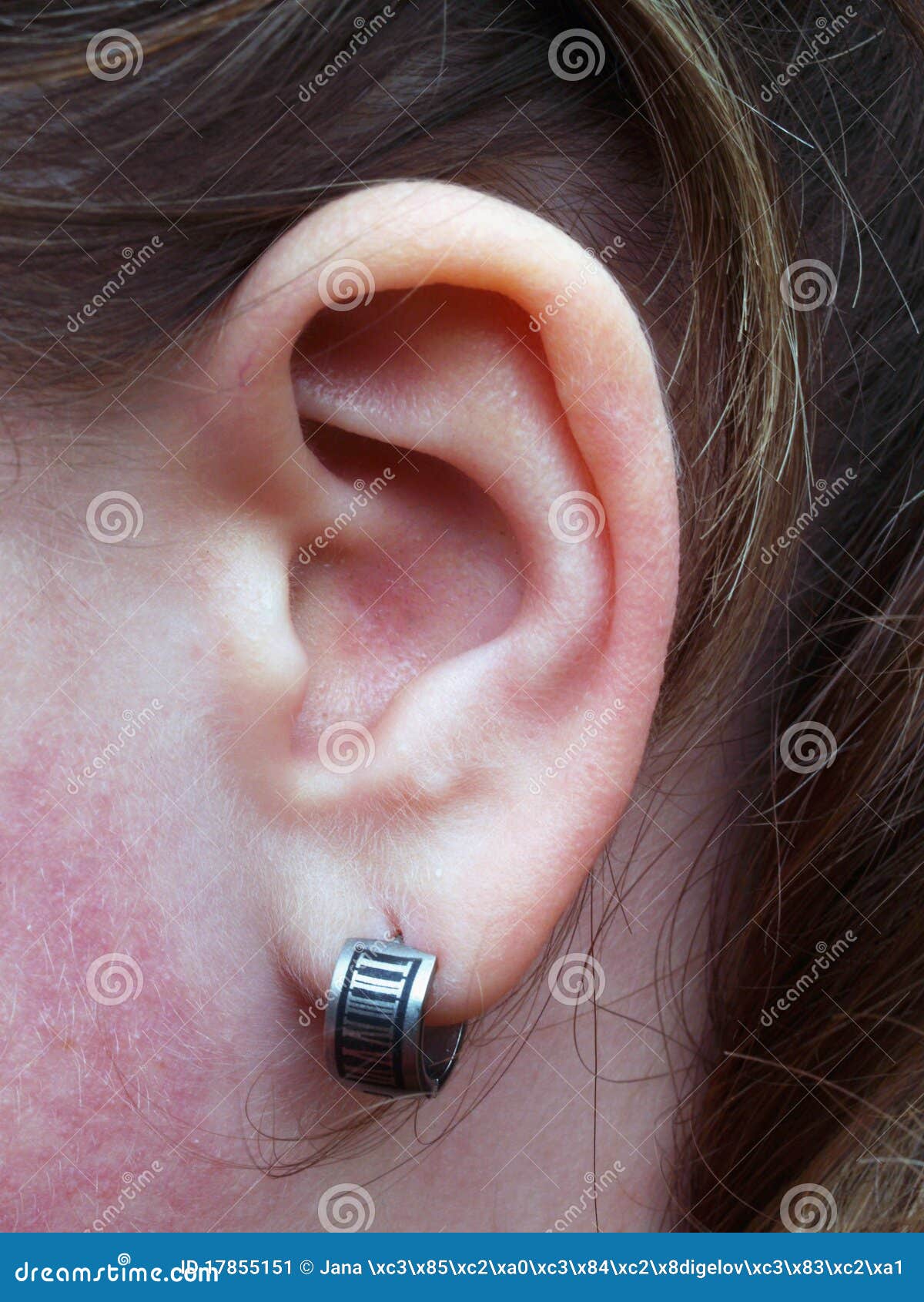 Ear with earring stock image. Image of steel, silver - 17855151