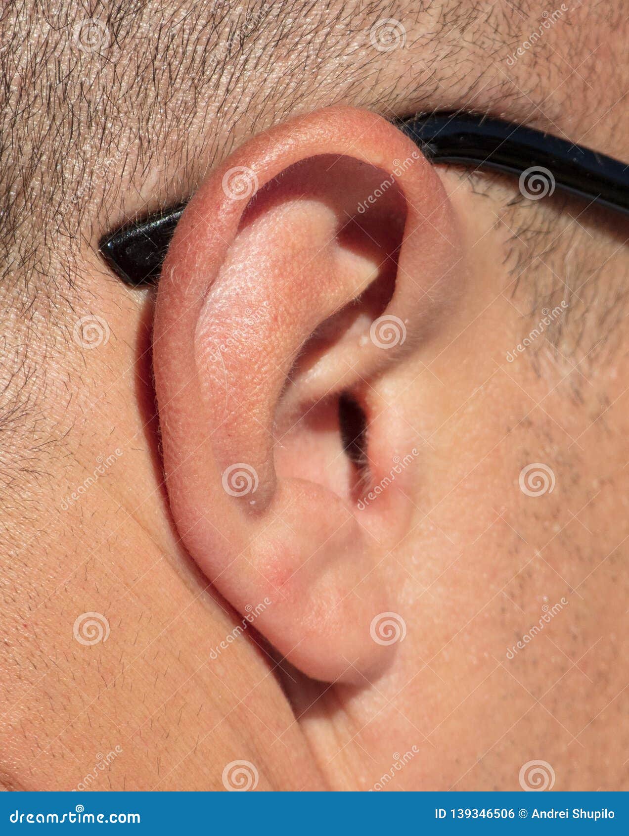 Ear on the head of a man stock photo. Image of shape - 139346506