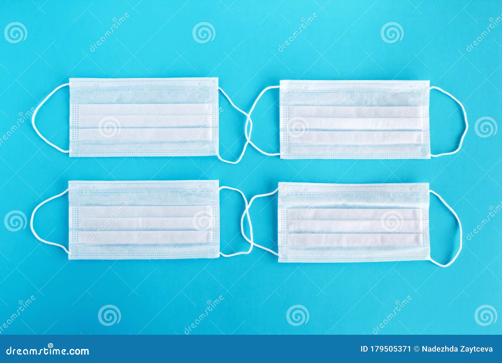 Ear-loop Face Masks Three Ply. Safety Masks on Blue Background Stock ...