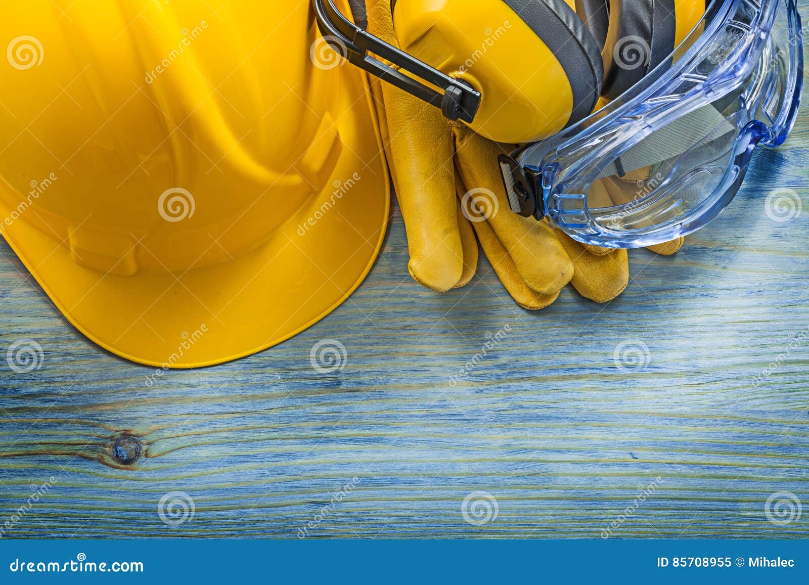 Ear Muffs Safety Glasses Gloves Hard Hat on Wood Board Construct Stock ...