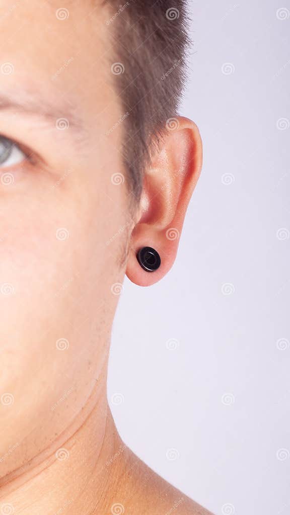 Ear Pierced Guy,man Wears a Piercing Stock Photo - Image of ears ...
