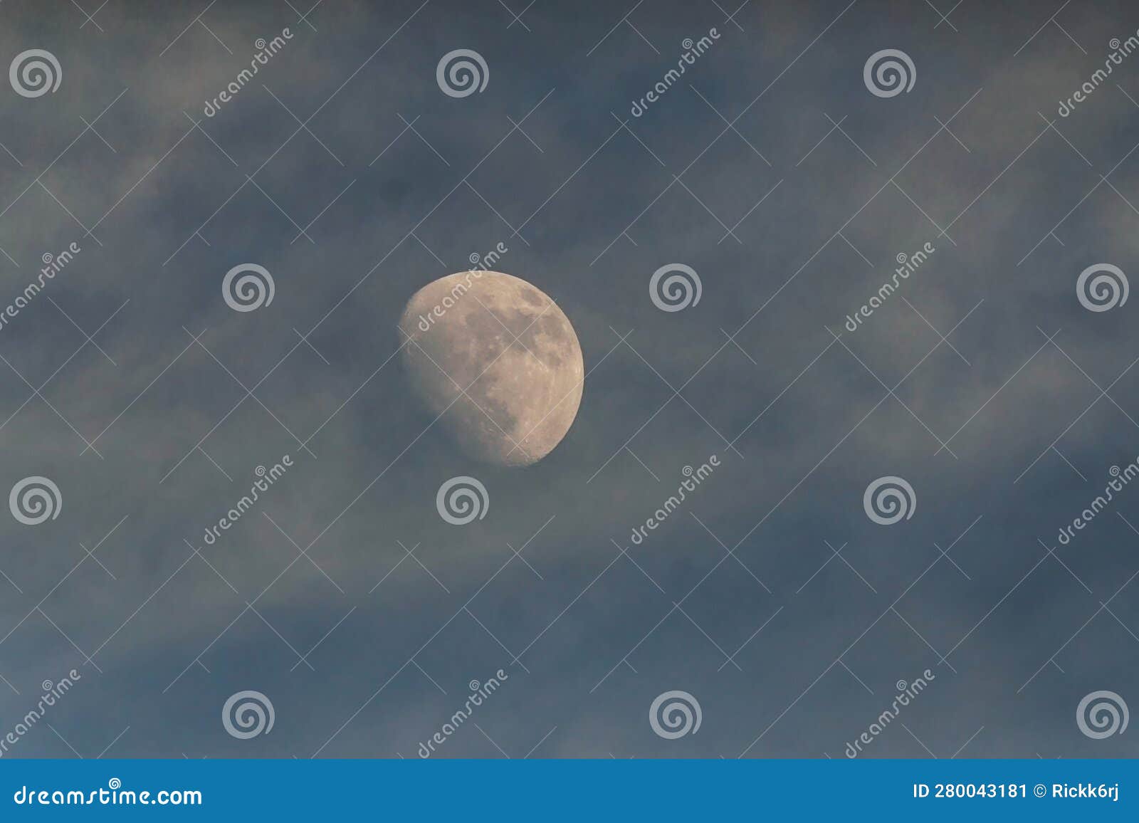 An Early Evening Moon among Light Clouds Stock Image - Image of ...