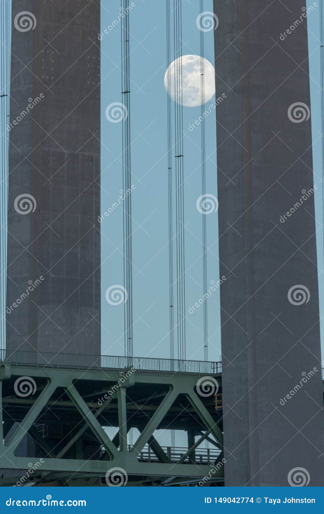 Early Full Moon Over a Suspension Bridge Stock Photo - Image of dusk ...