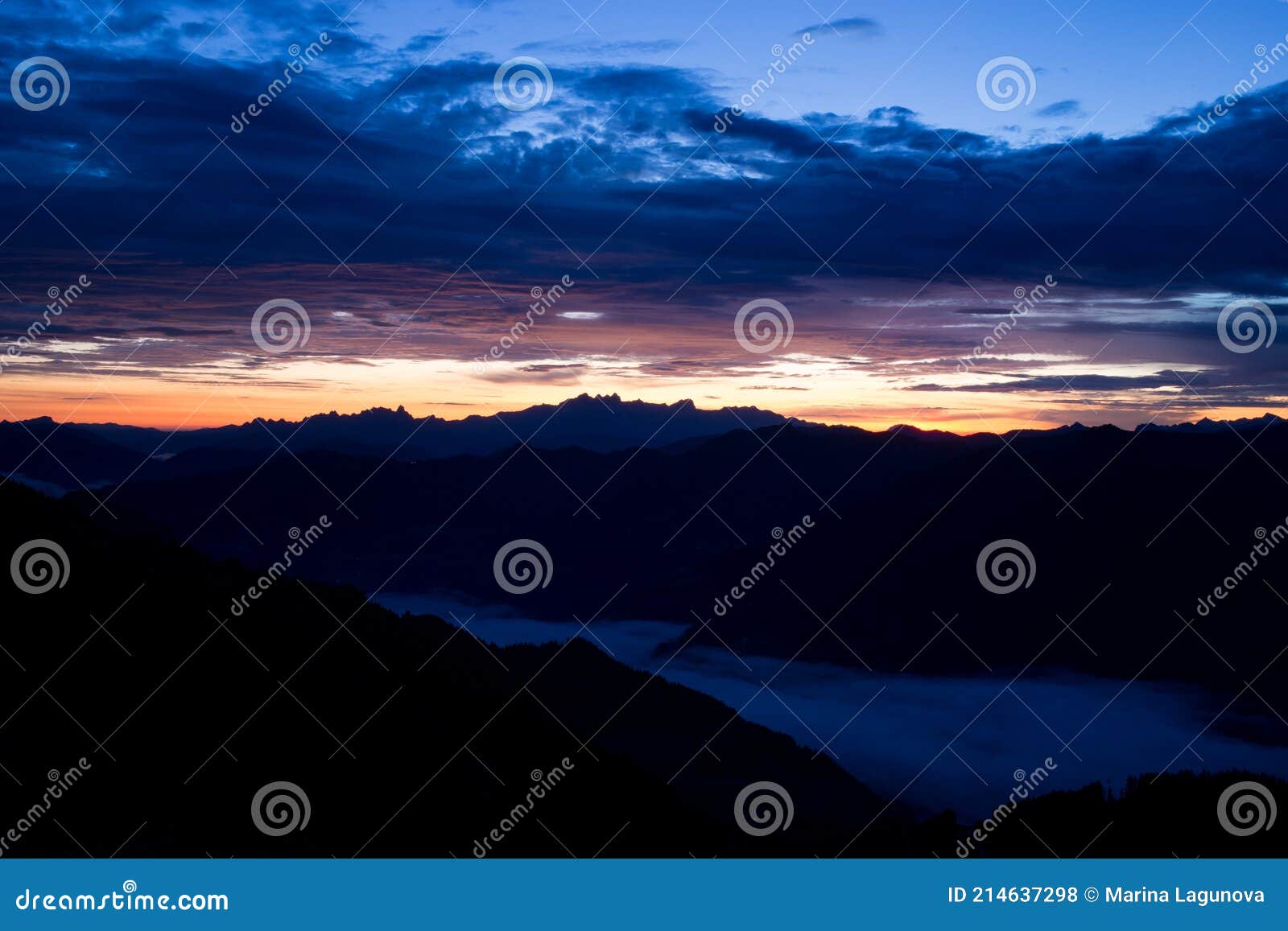 Early Morning in the Mountains. the Sun Rises Over the Mountains Stock ...