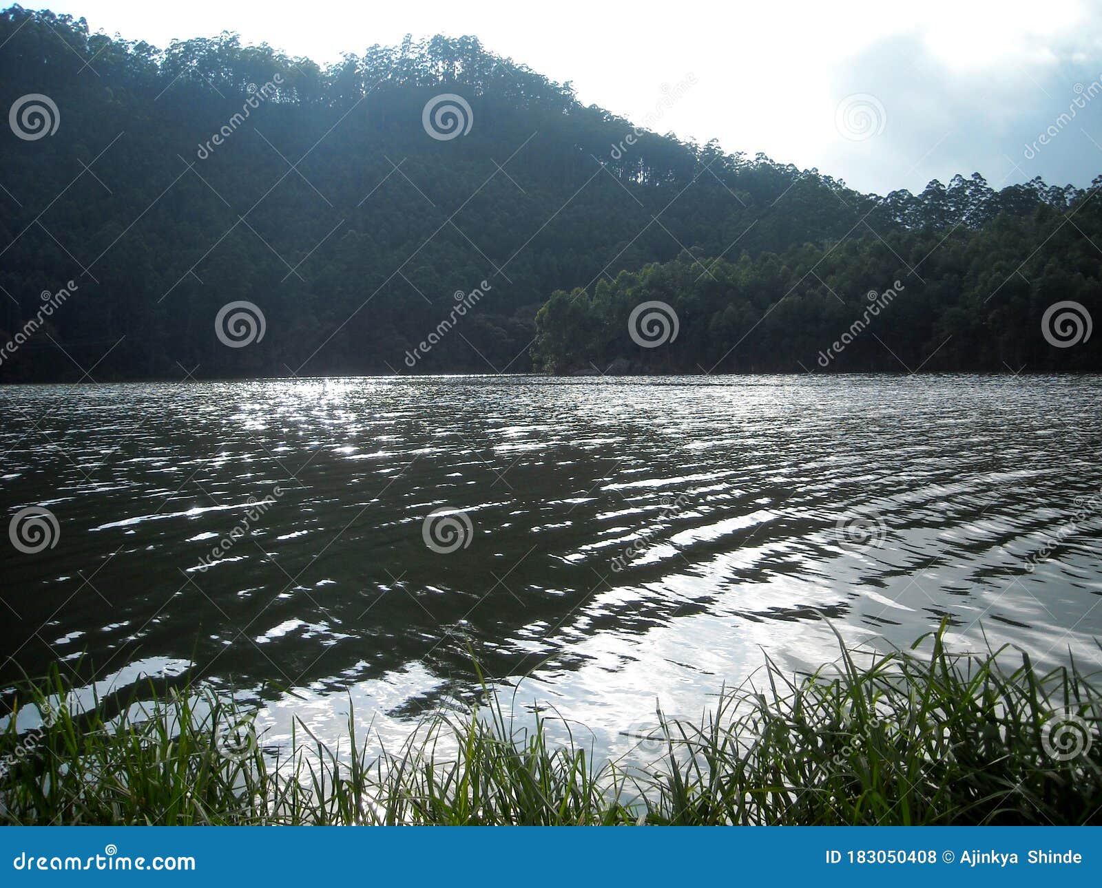 Sun Rays on water waves stock photo. Image of lake, light - 183050408