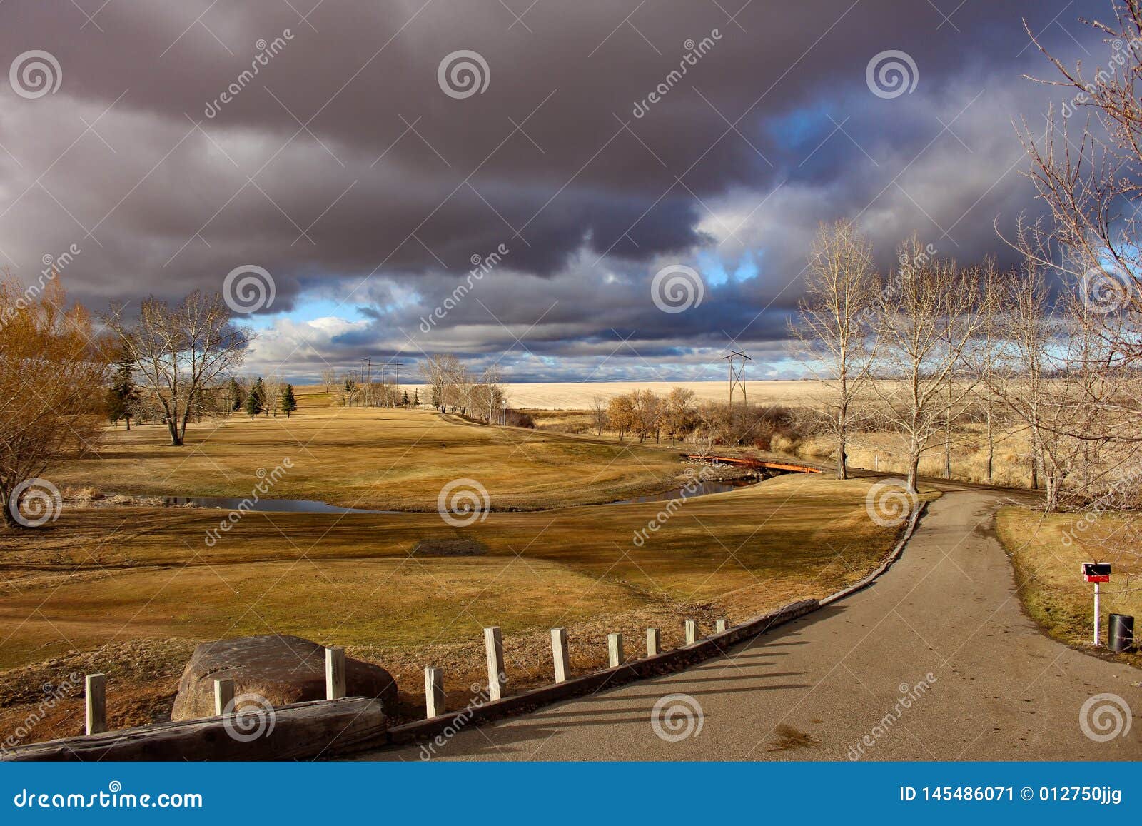 Early Spring Brooding Sky at Flowing Springs Golf Greens Stock Image ...