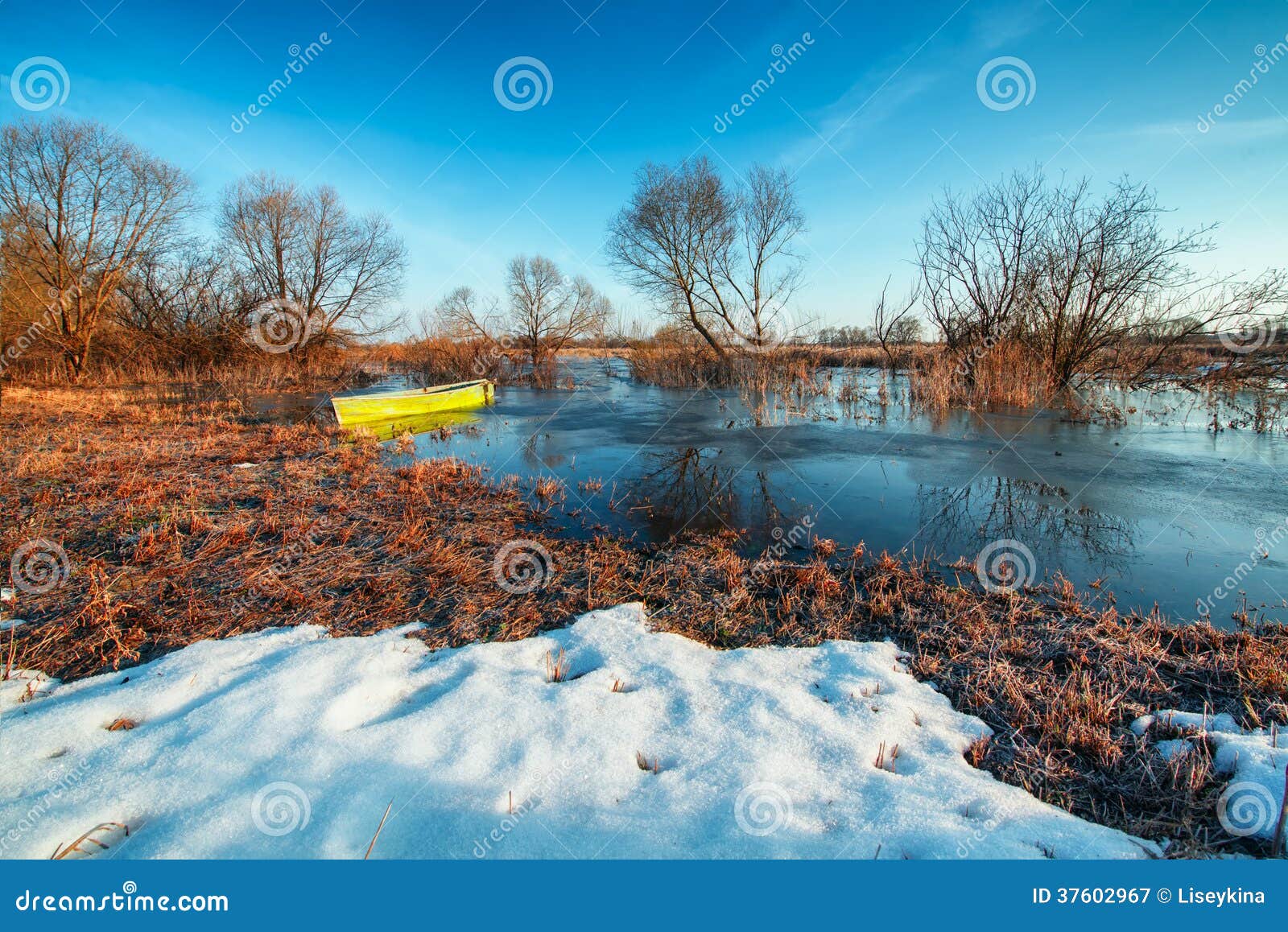 Early Spring Landscape with Wooden Boat Stock Image - Image of snow ...
