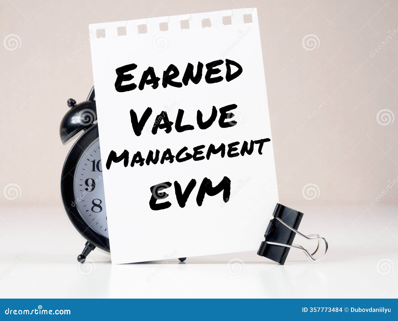 Earned Value Management EVM Header on White Note Paper Background Alarm ...
