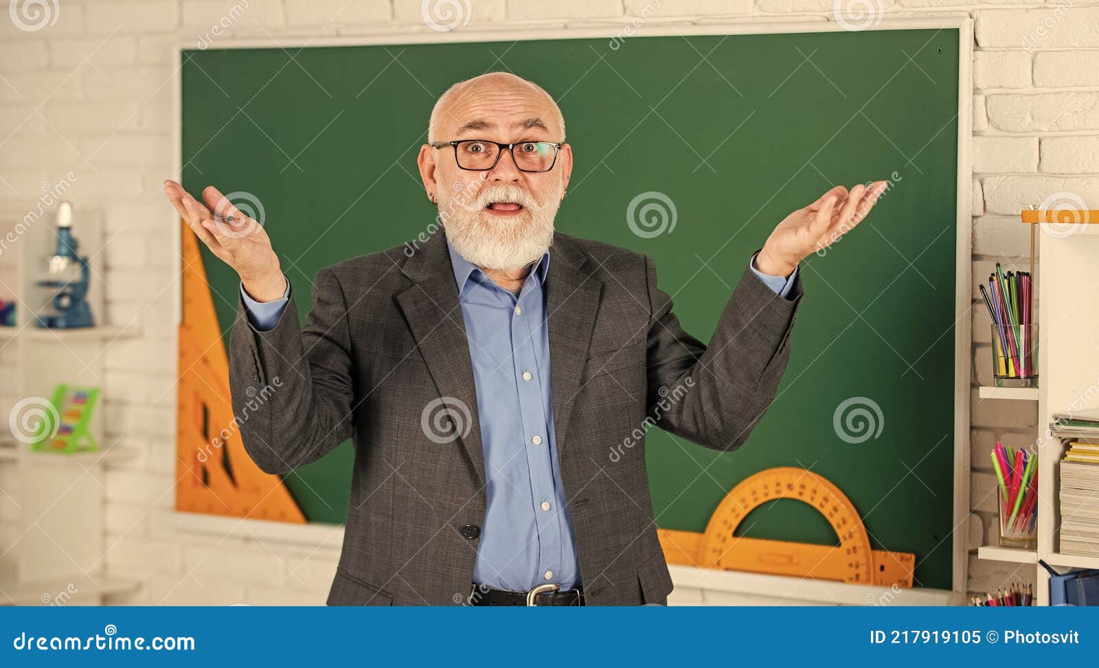 Teacher Man At Chalkboard Holding Ruler, Math Subject Concept Royalty ...
