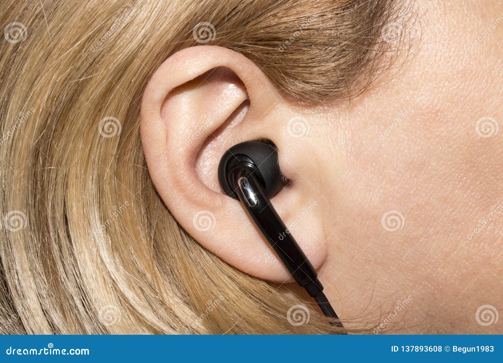 Earpiece in the human ear. stock photo. Image of attractive - 137893608