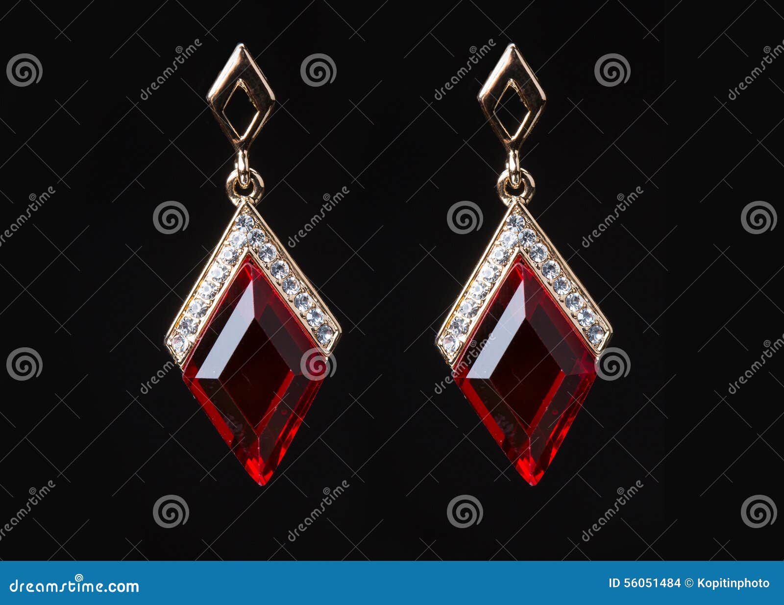 Earring with Colorful Red Gems on Black Background Stock Photo - Image ...