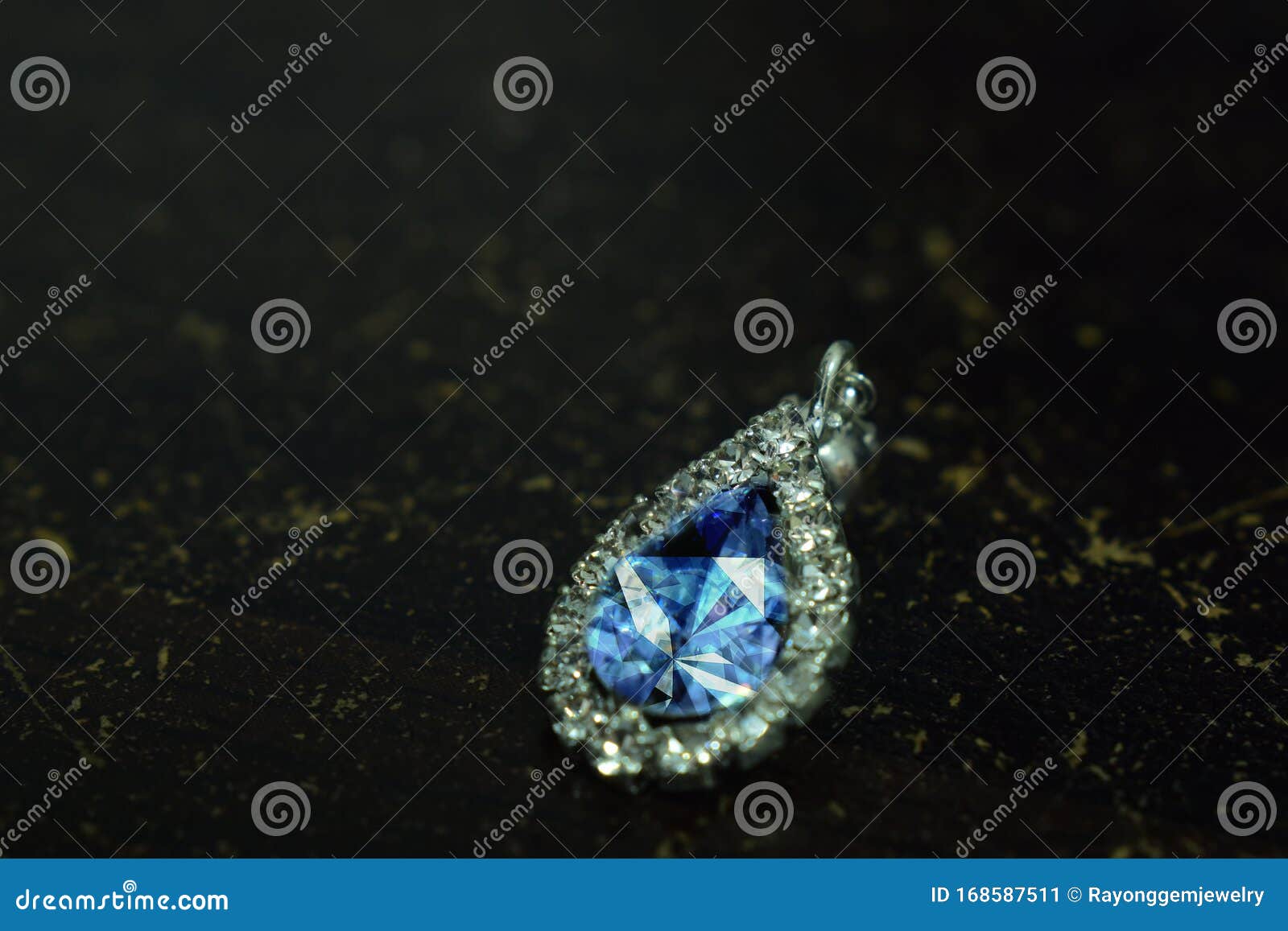 Earring Decorated with Blue Gemstones Surrounded by Diamonds Stock ...