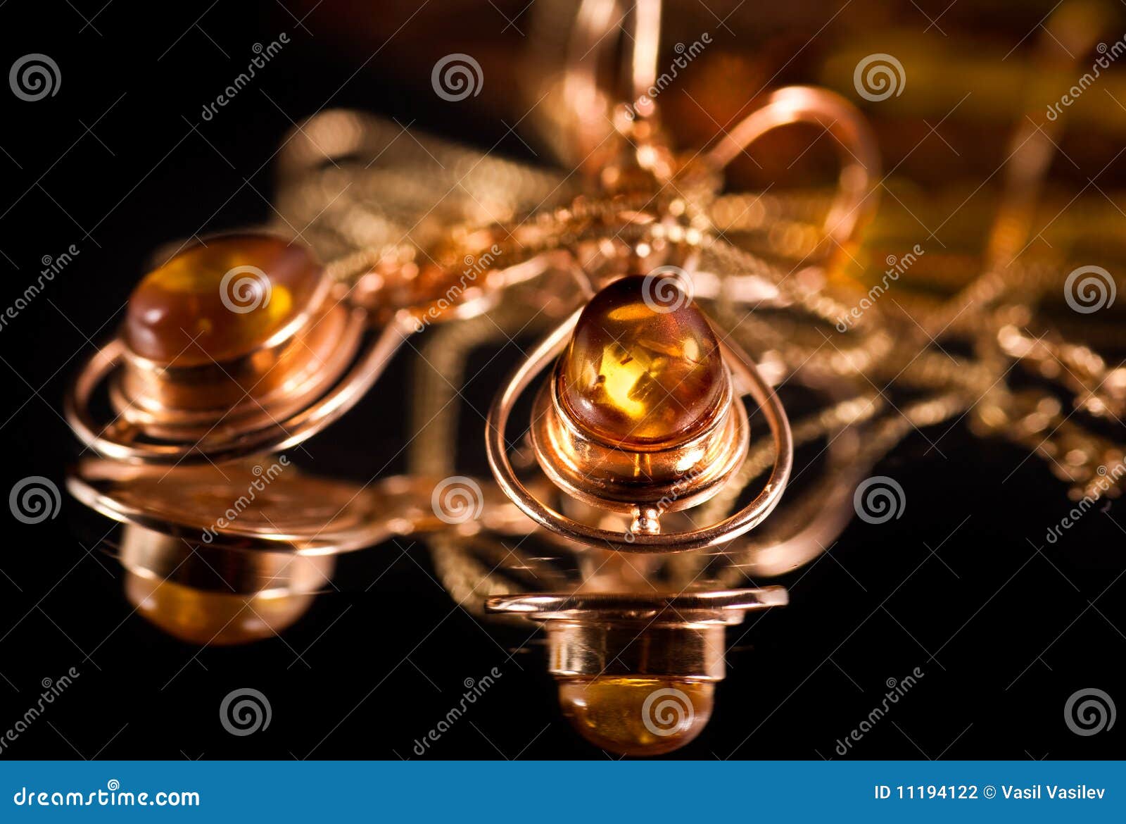 Earrings with Precious Amber Stock Photo - Image of reflection, macro ...