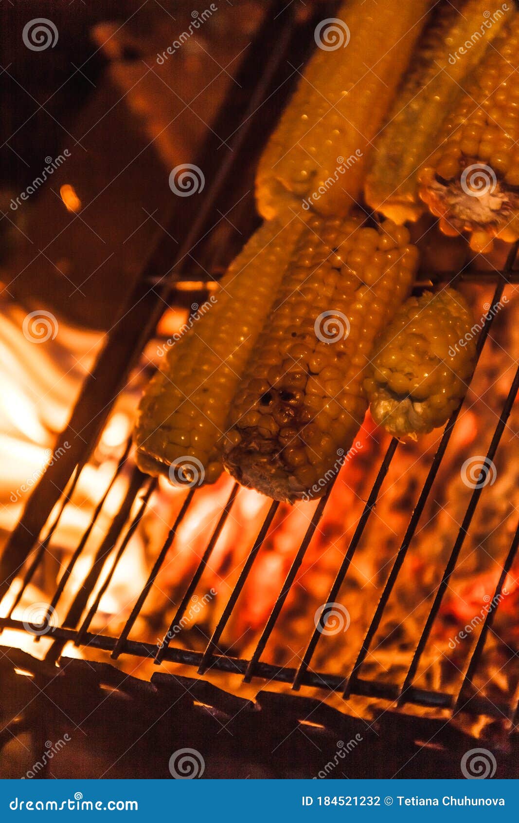Ears of Corn on a Grill Over High Heat, Night Shooting. Stock Photo ...