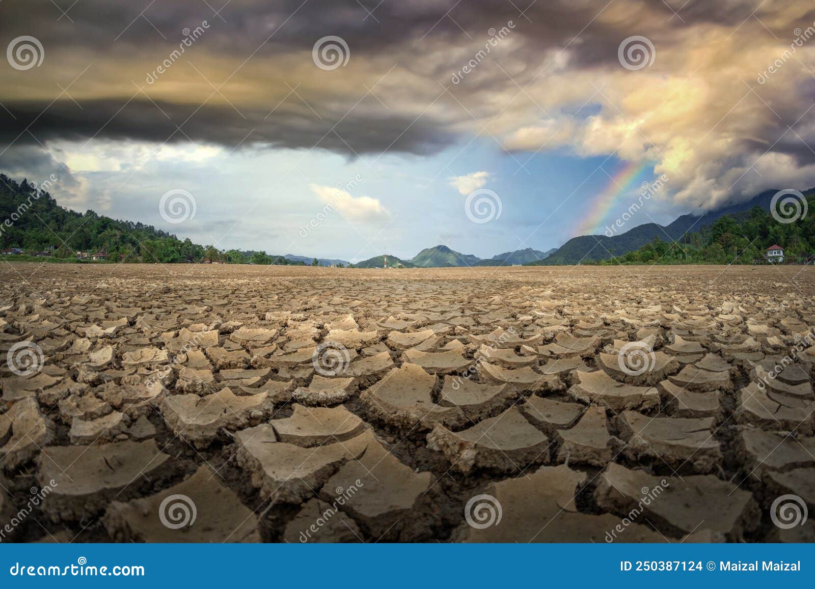 Earth Crack Landscape with Rainbow and Cloudy Sky Stock Photo - Image ...