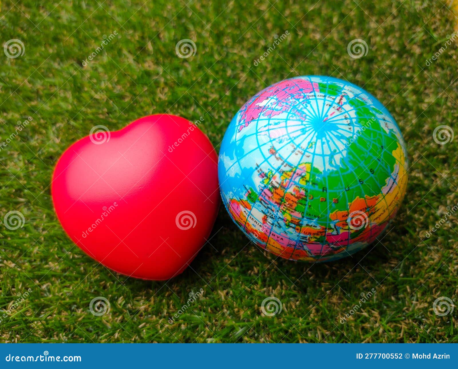 Earth globe with red heart stock photo. Image of international - 277700552
