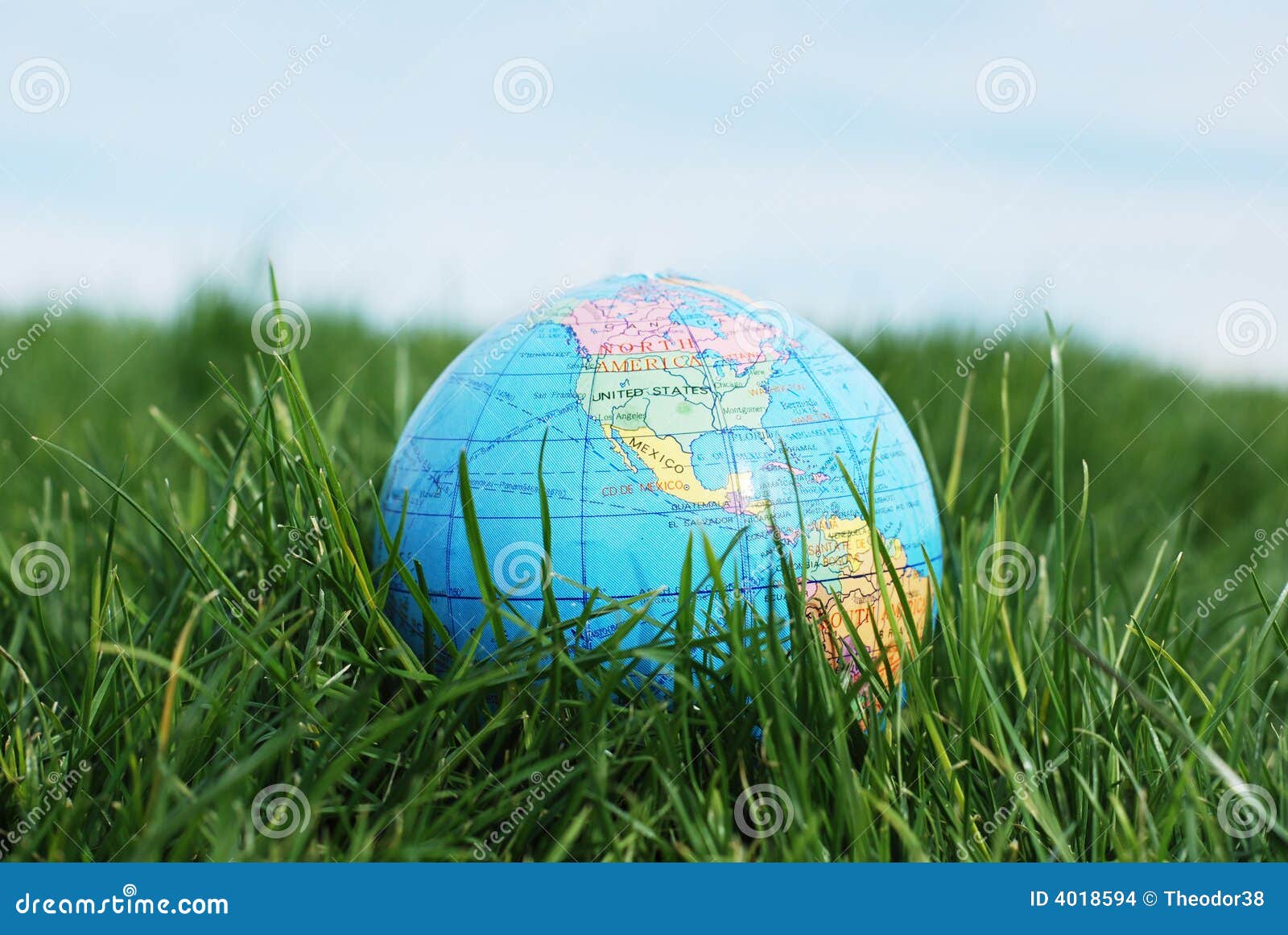 Earth on grass stock photo. Image of green, environment - 4018594