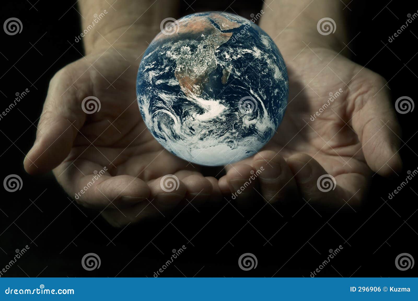 Earth on the hands stock photo. Image of painting, joining - 296906