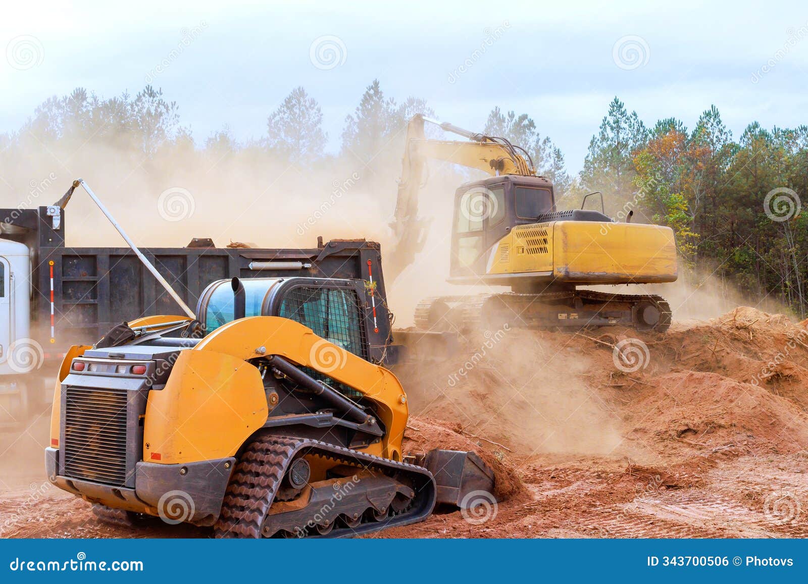 Earth Loading is Process of Moving Earth into a Dump Truck Using an ...