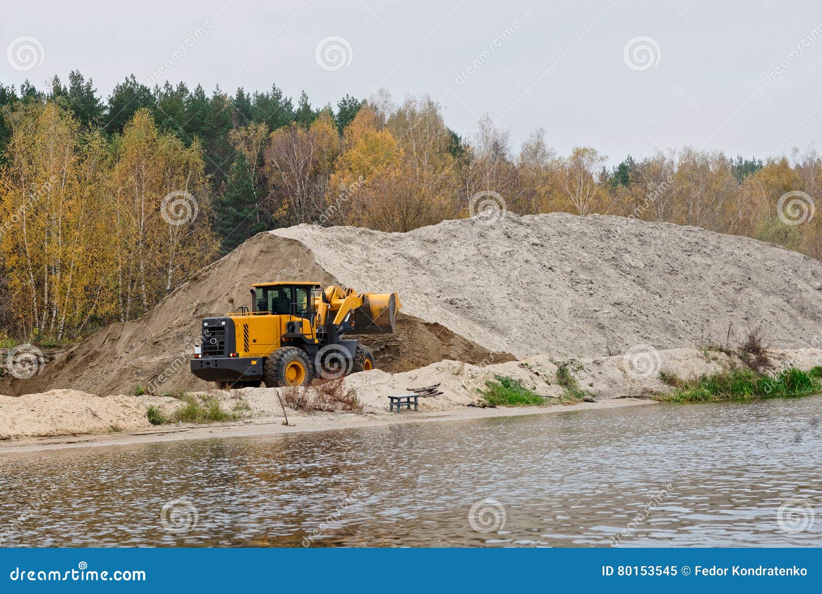 Earth-mover and Large Pile of Bank Sand Stock Image - Image of river ...