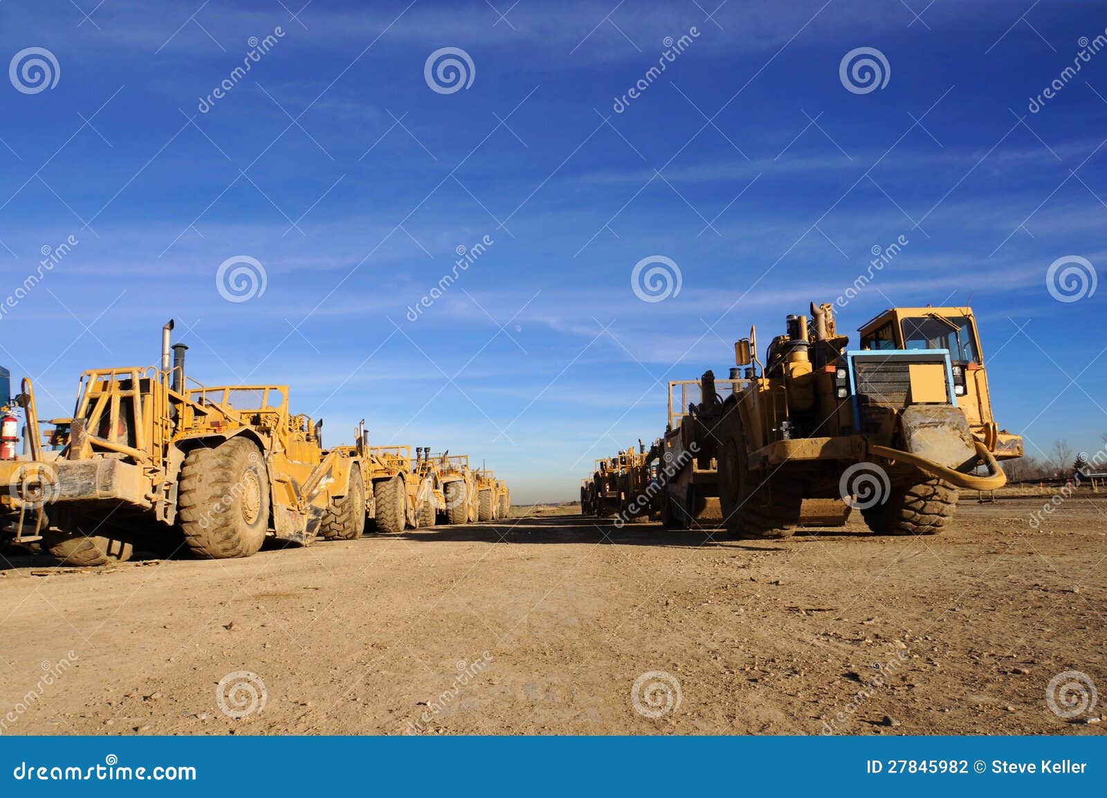 Earth Movers Grading Surfaces Stock Photo - Image of diesel, tractors ...