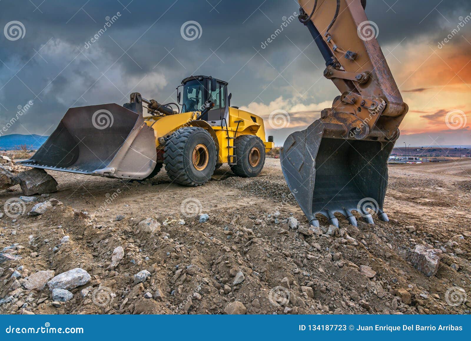 Earth Moving Heavy Equipment Excavators During At Construction Backhoe ...