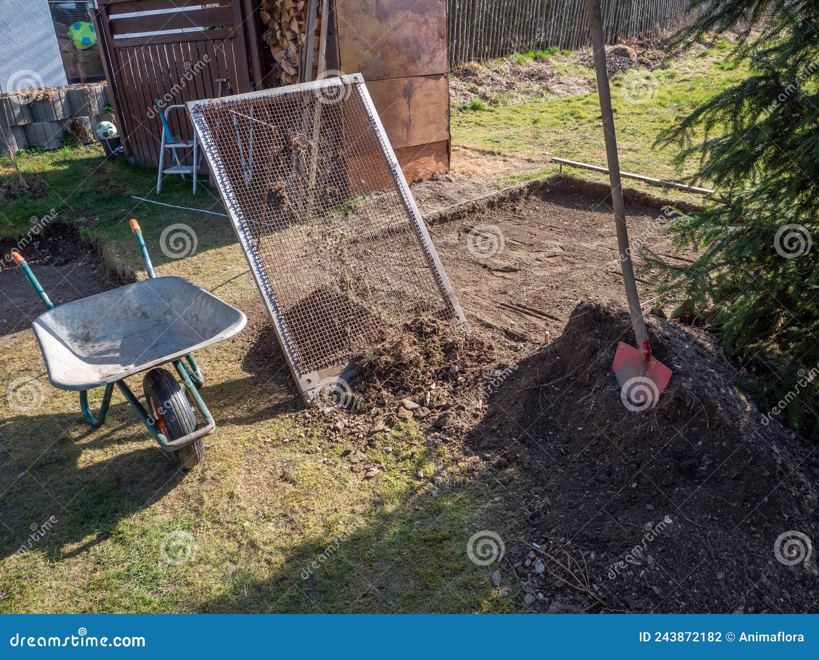 A Sifting Of Earth Through Sieve. Iron Shovel, Iron Barrel, Small Iron ...