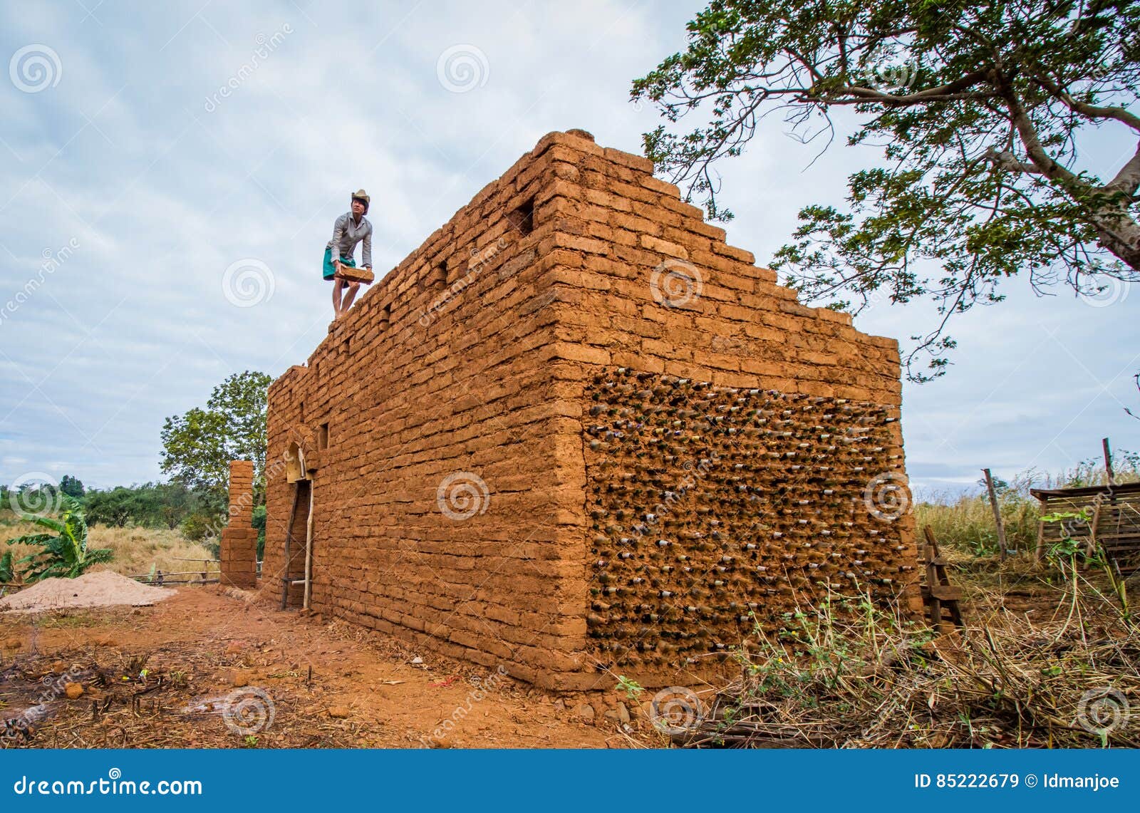 Earthen house building stock image. Image of brick, hand - 85222679