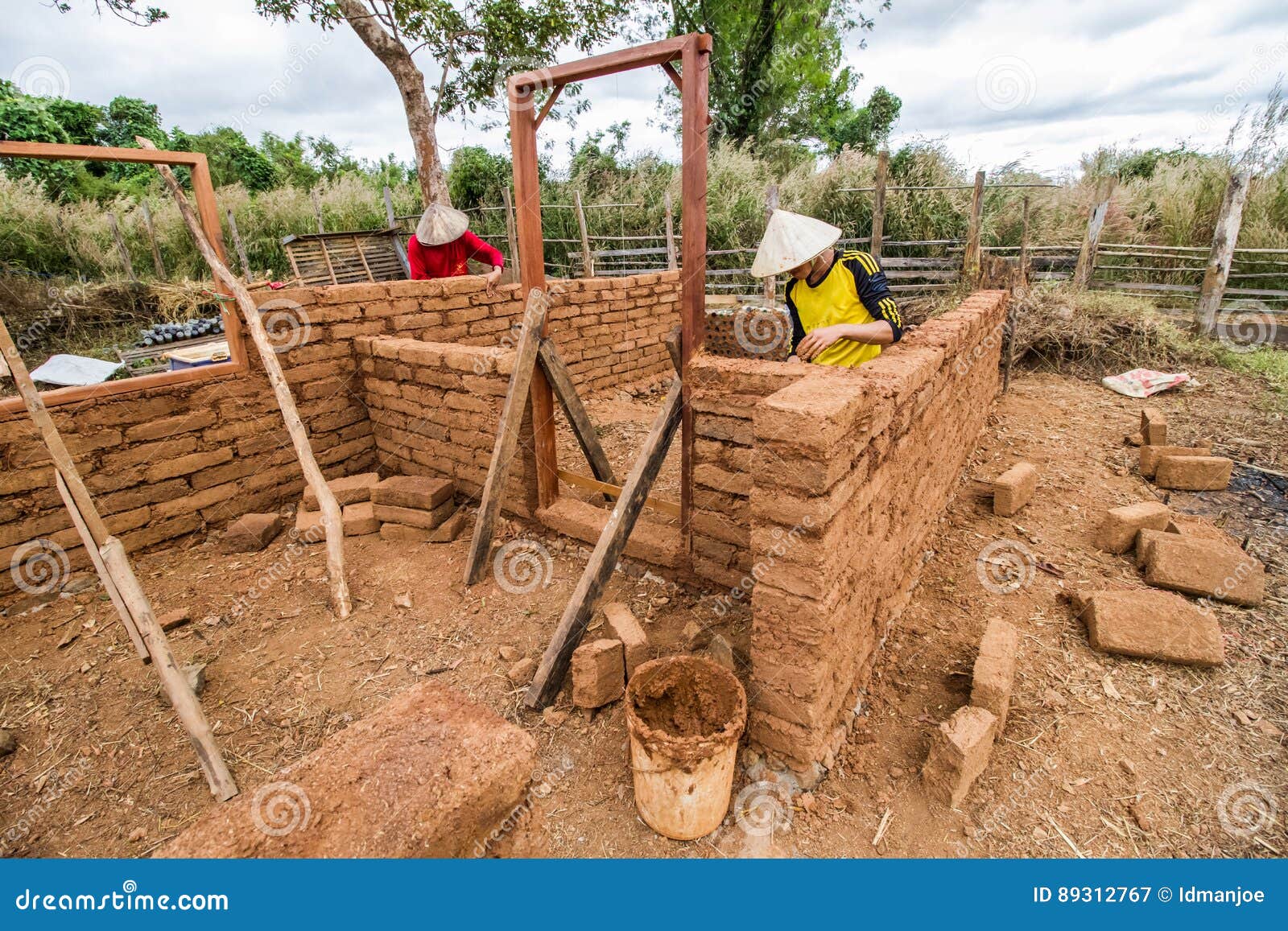 Earthen House Under Shade Of Trees. An Earth House, Also Known As Earth ...
