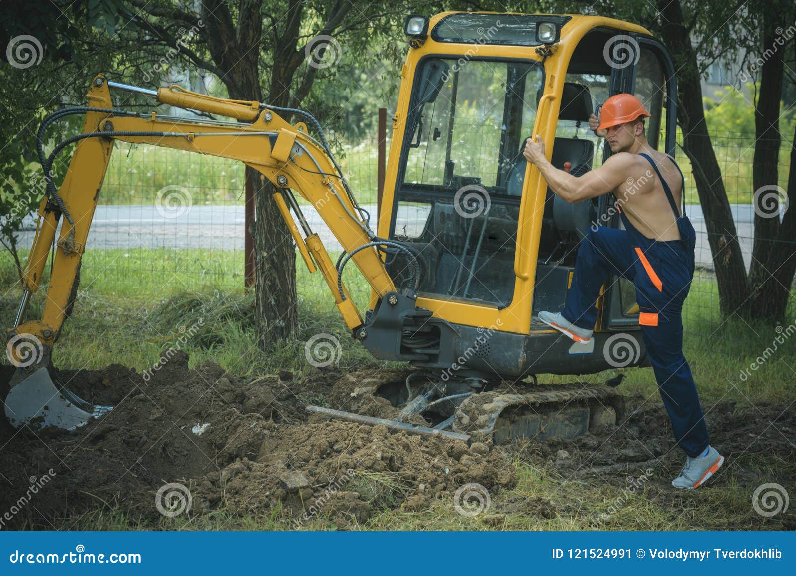Earthwork Concept. Earthwork Operator At Excavator. Man Climb On Digger ...