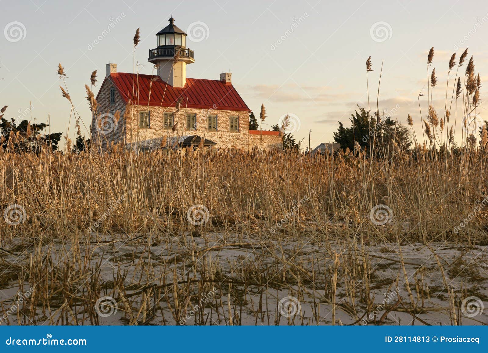 East Point Lighthouse in New Jersey Stock Image - Image of beach, grass ...