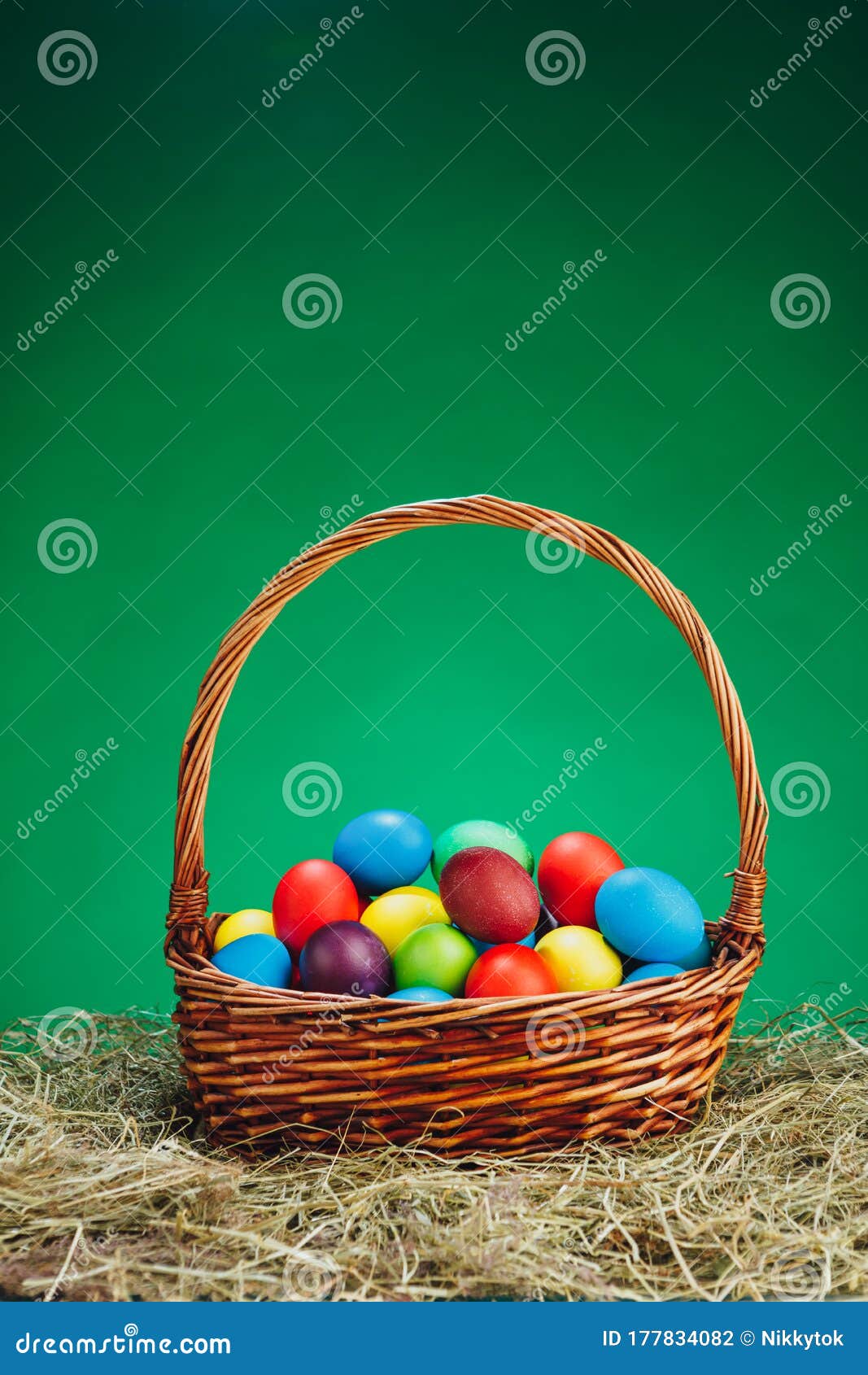 Easter Basket with Multicolor Eggs, Green Background Stock Photo ...