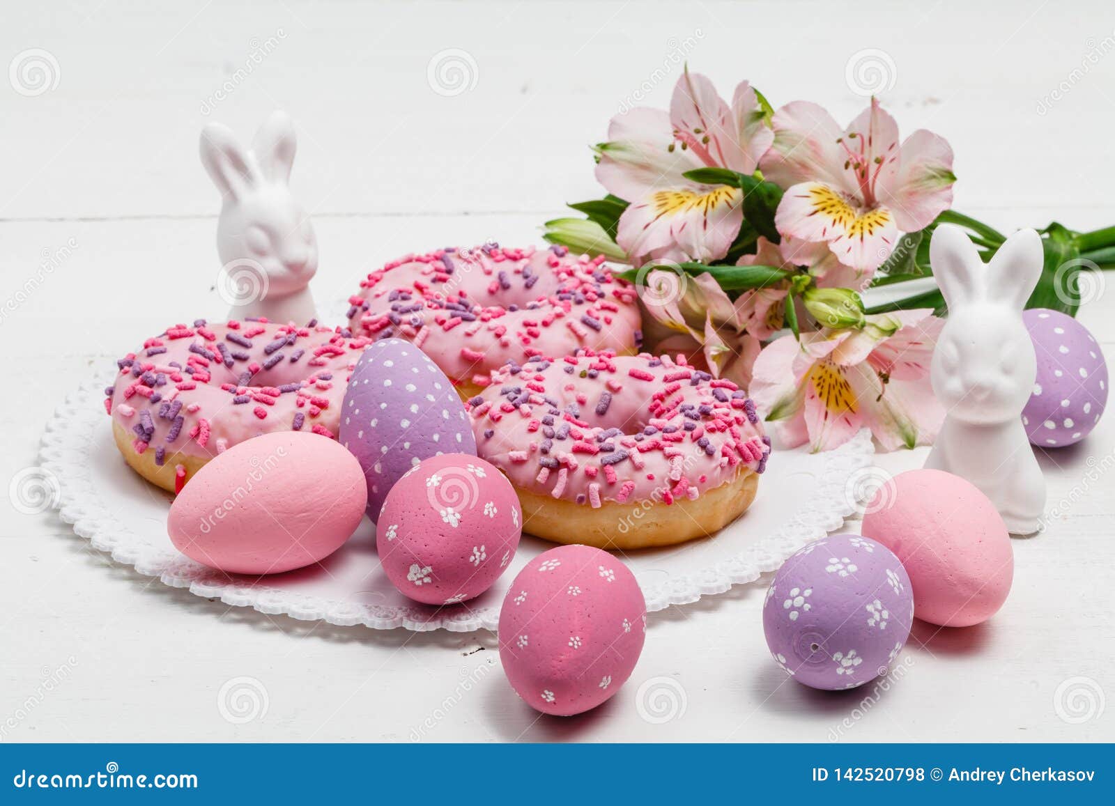 Easter Bunnies and Eggs on the Table with Donuts Stock Photo - Image of ...